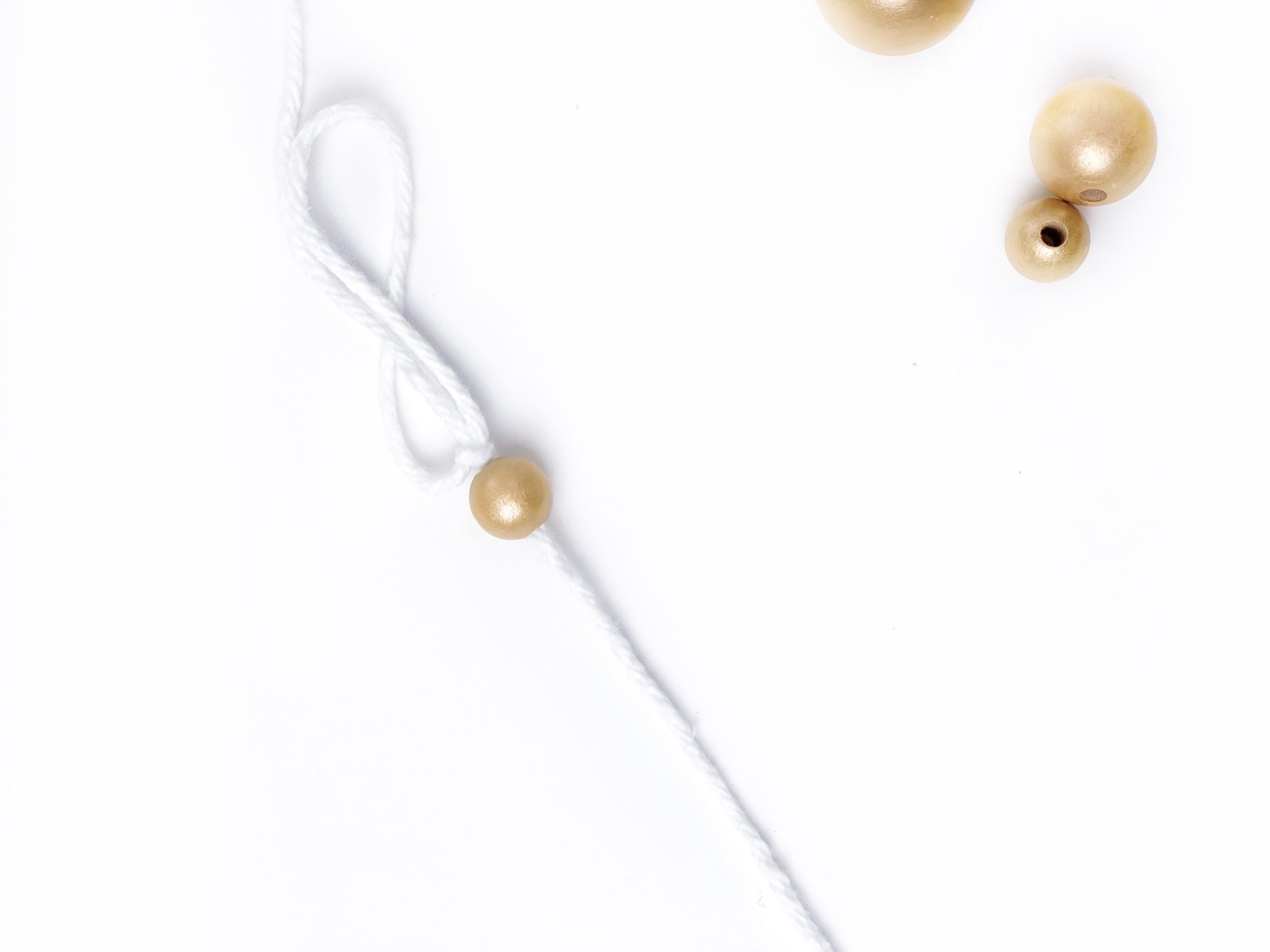 DIY: Wooden Bead Ornaments - Dwell & Dine