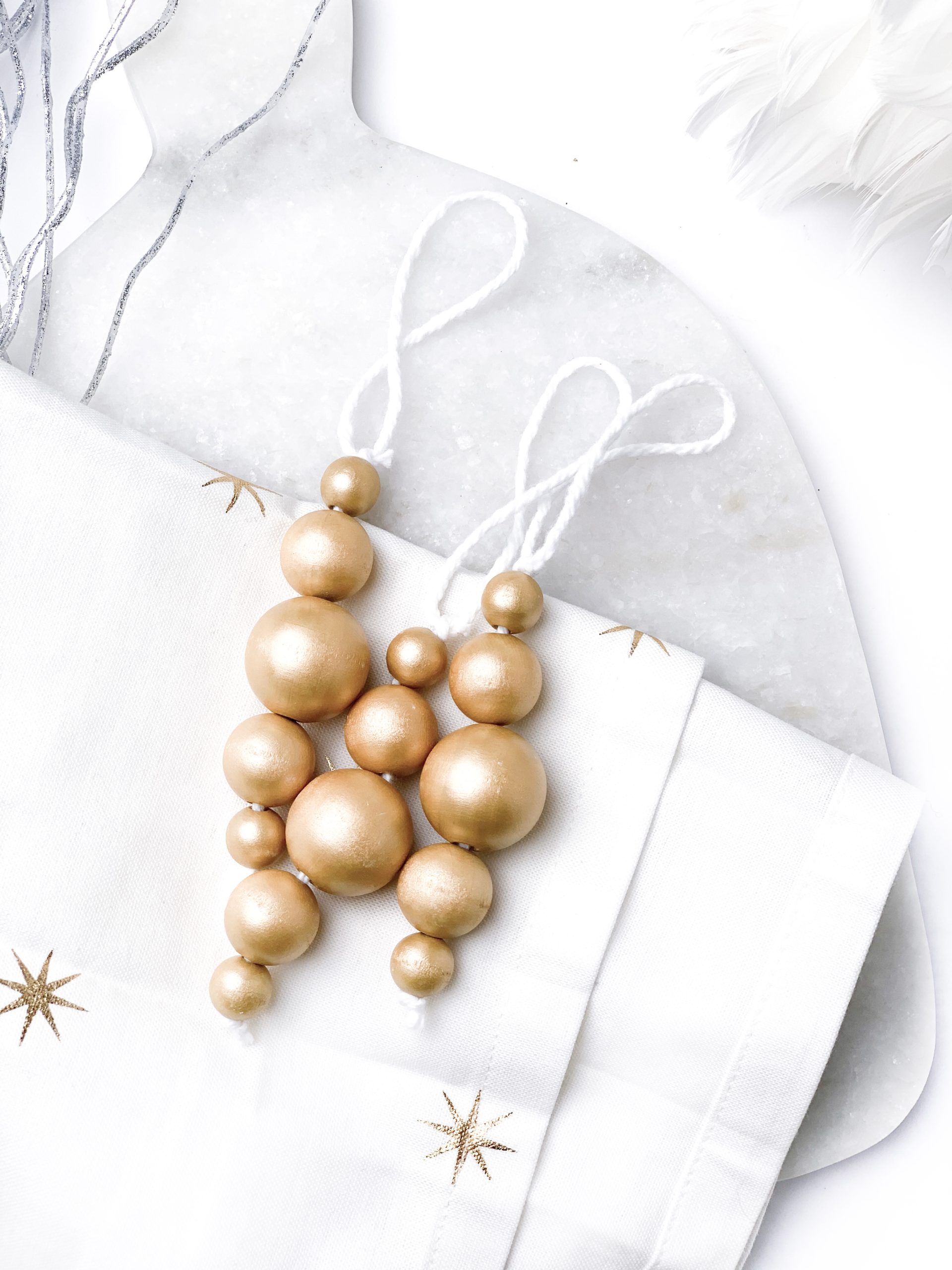 DIY: Wooden Bead Ornaments - Dwell & Dine